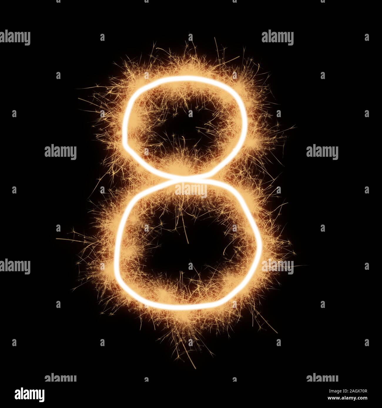 Symbol of number eight written by squib sparks on a black background ...