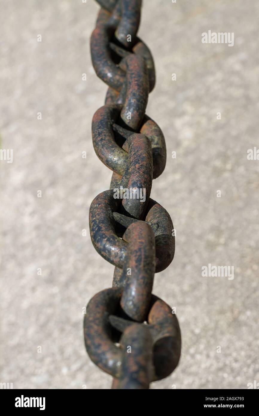 Metal chain on old carriage road to castle Stock Photo - Alamy