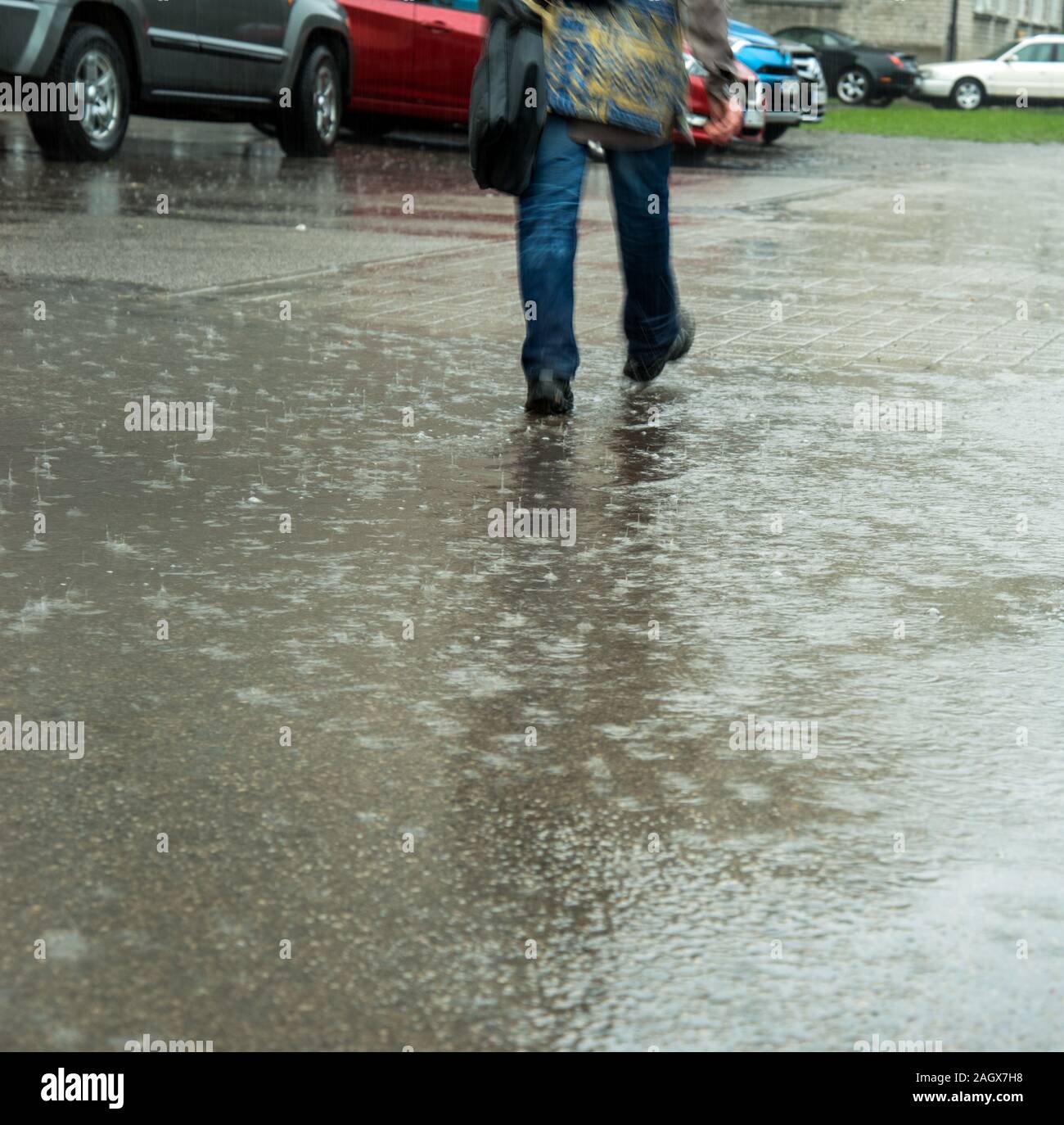 Car puddle pedestrian hi-res stock photography and images - Alamy