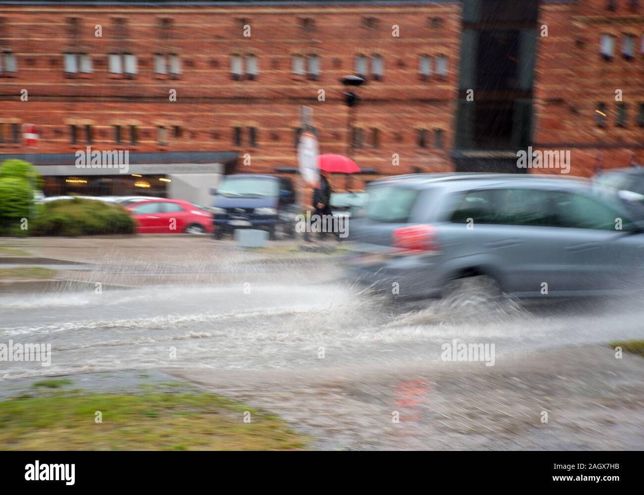 Motion on street in rain Stock Photo - Alamy