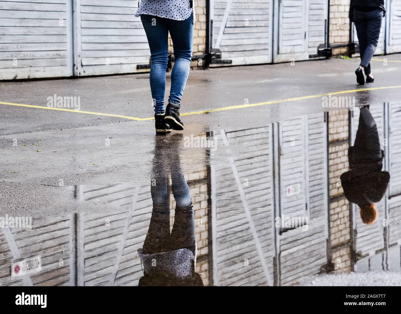 Reflection in water puddle, rainy day Stock Photo - Alamy