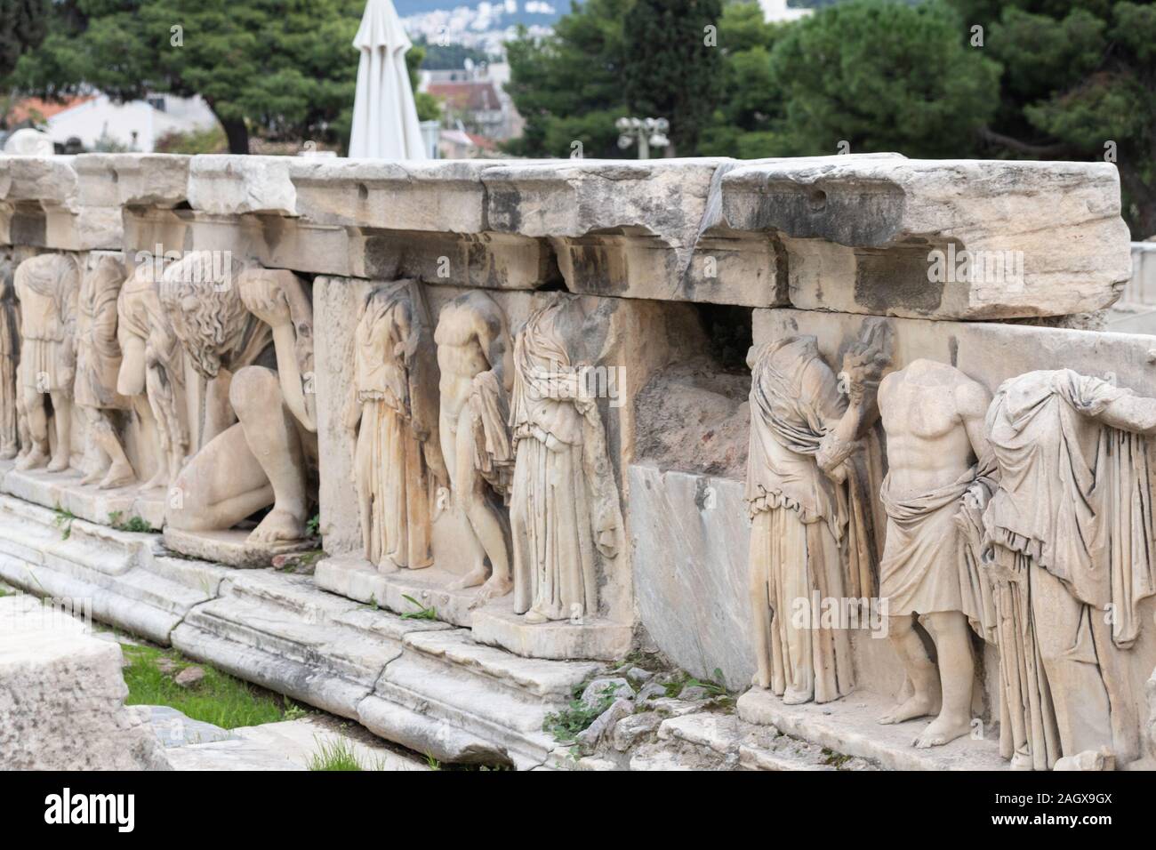 Old ancient marble figures in the teathre of dionysus in athens greece ...
