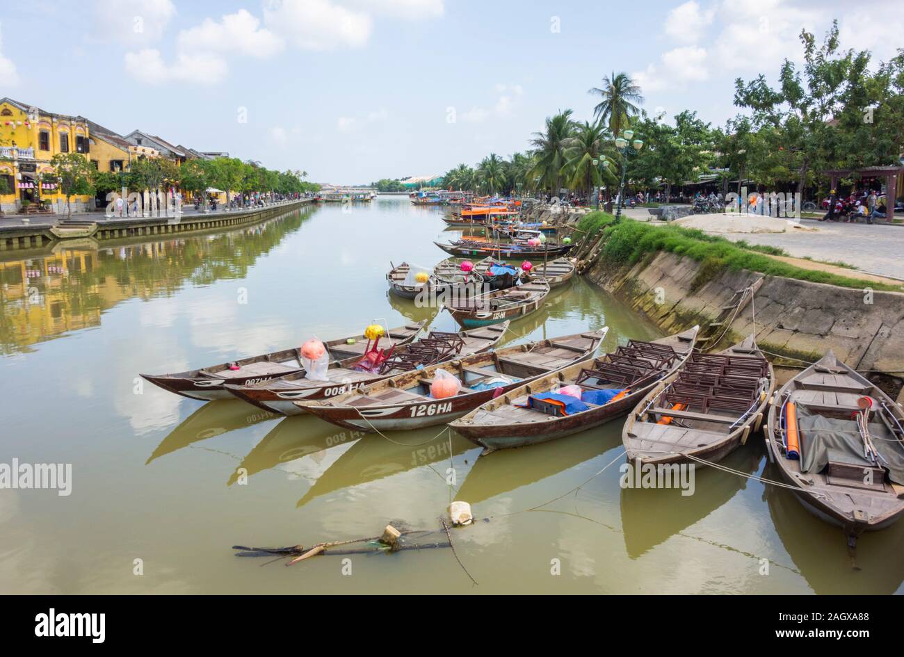 Boats and reflections Thu Bon River Hoi An Vietnam Stock Photo - Alamy