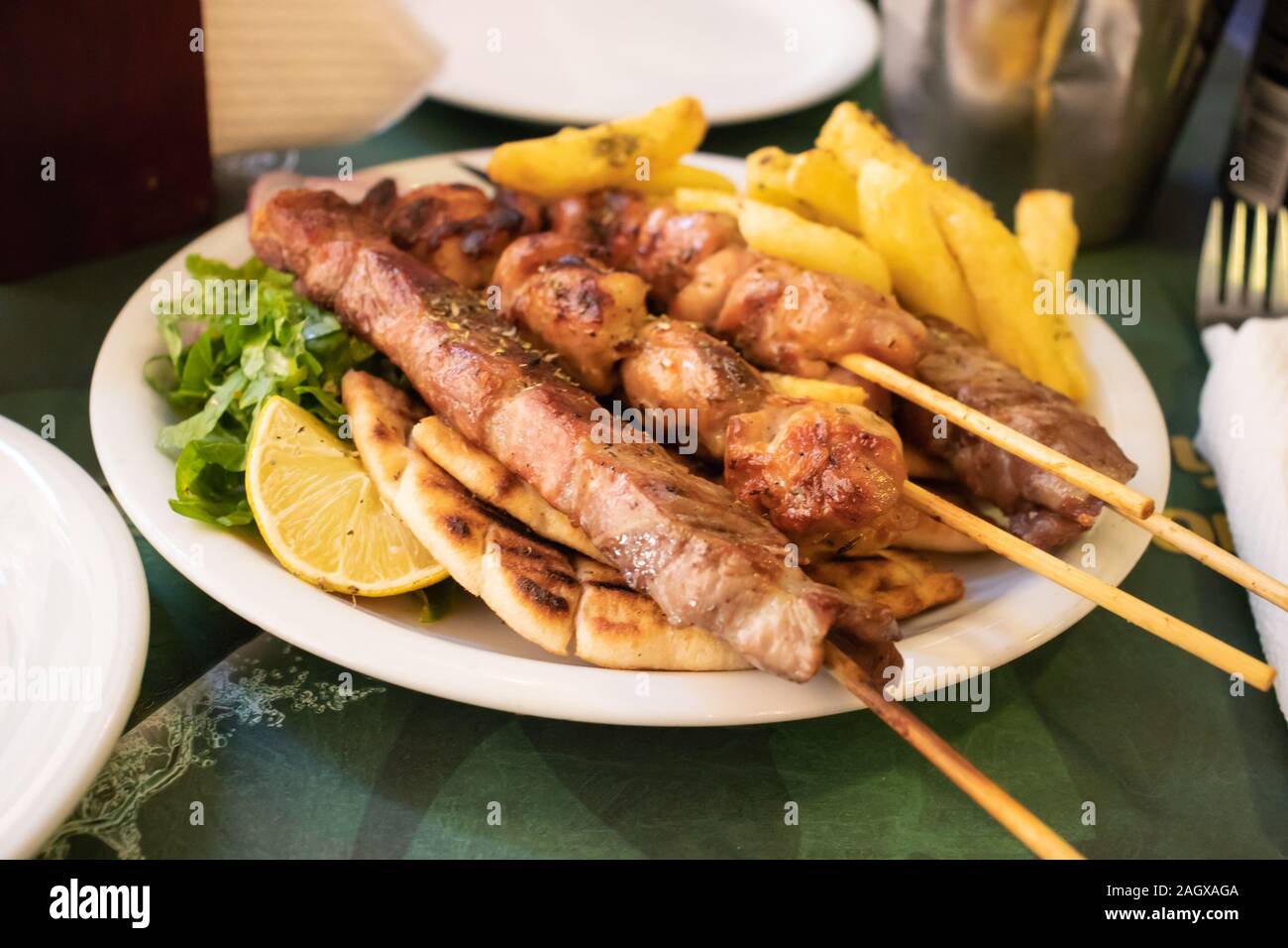 Traditional souvlaki greek dish with chicken and meat in athens Stock ...