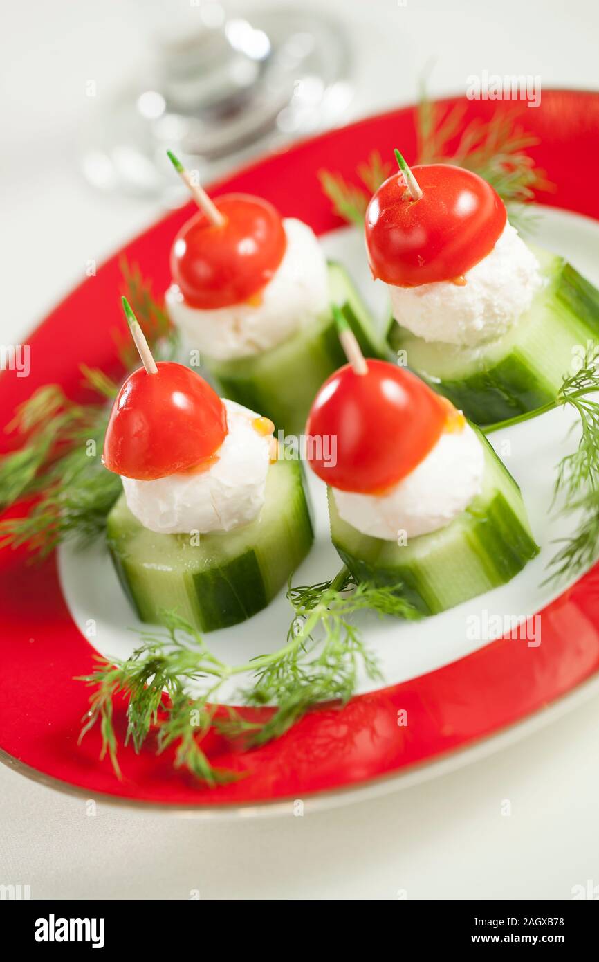 Tomato cheese cucumber finger food Stock Photo - Alamy