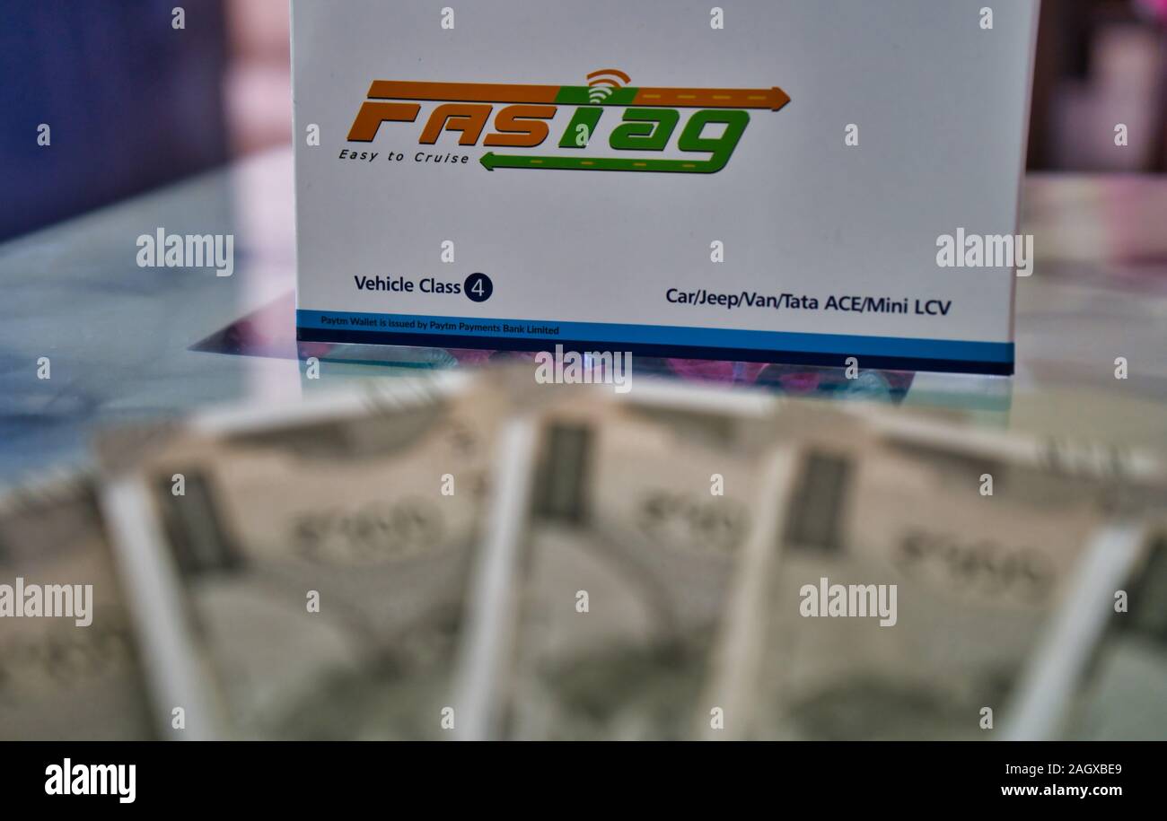 Photograph of Fast Tag on a beautifully crafted table along with ...