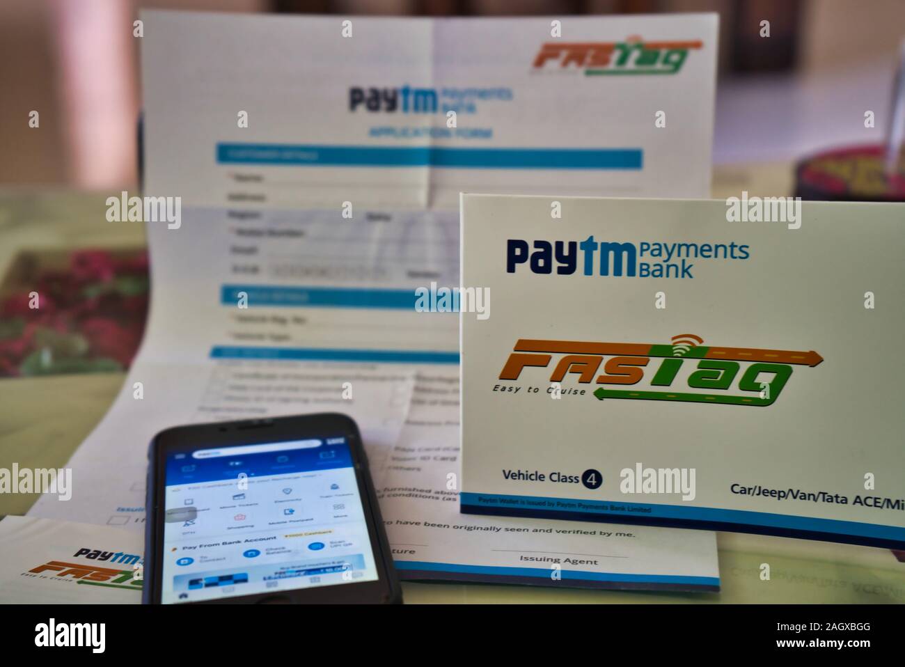 Fast Tag along with a mobile phone on the table, the application form ...