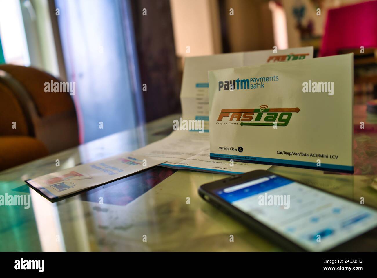 Fast Tag along with a mobile phone on the table, the application form ...