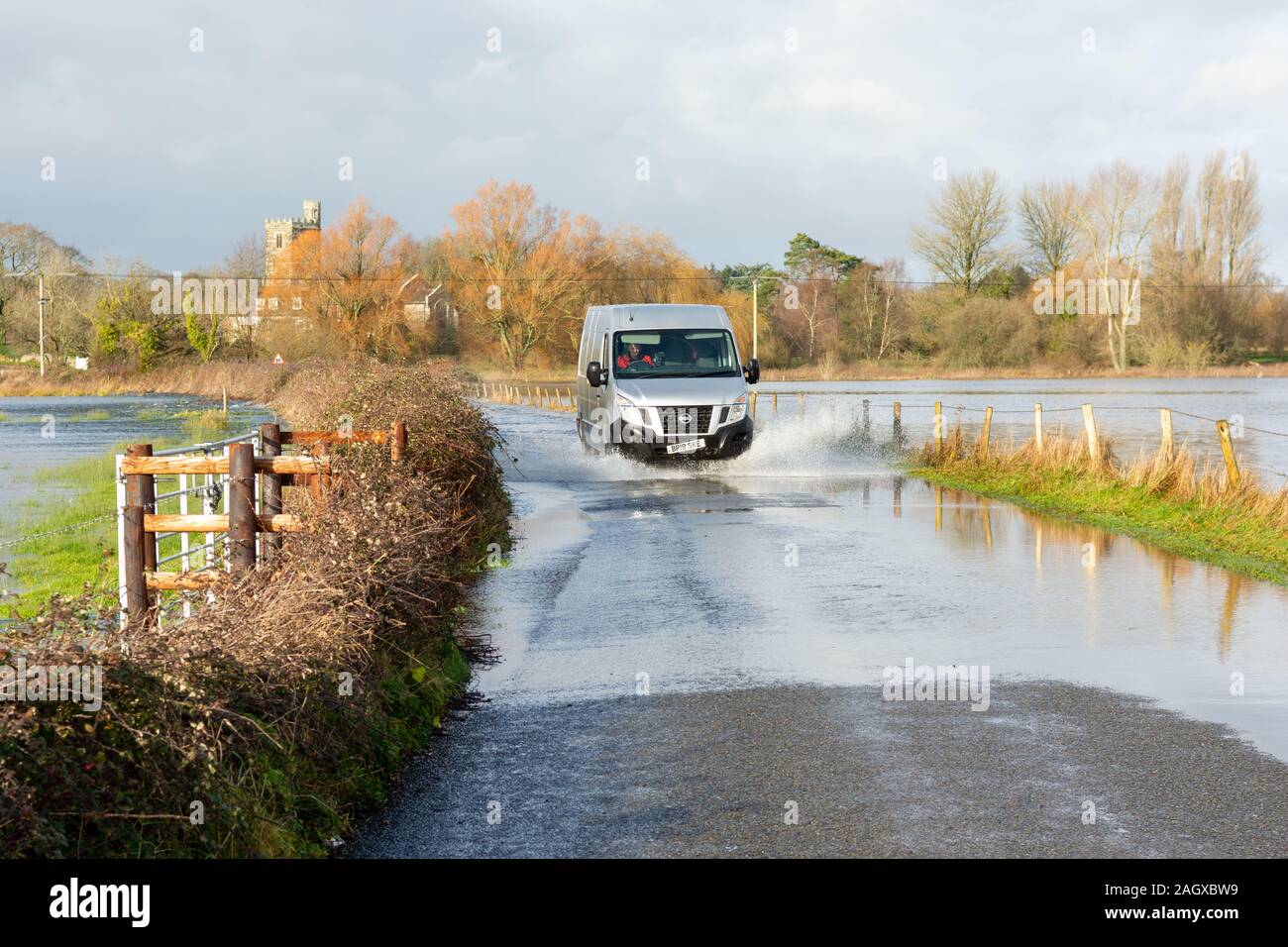 Van driving through floodwater Stock Photo - Alamy