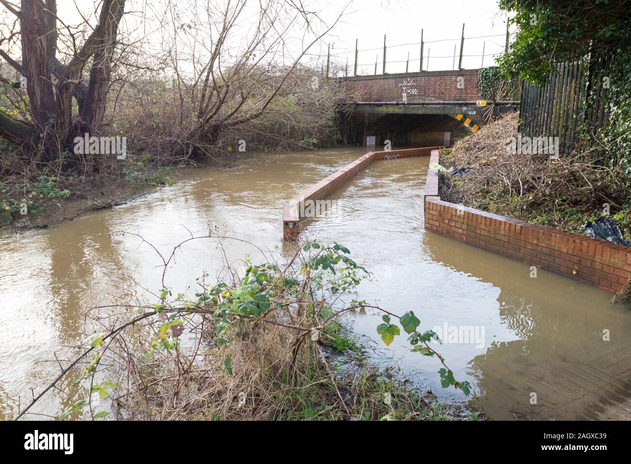 Ashford, Kent, UK. 22nd Dec, 2019. UK Weather: Flooding on footpaths ...