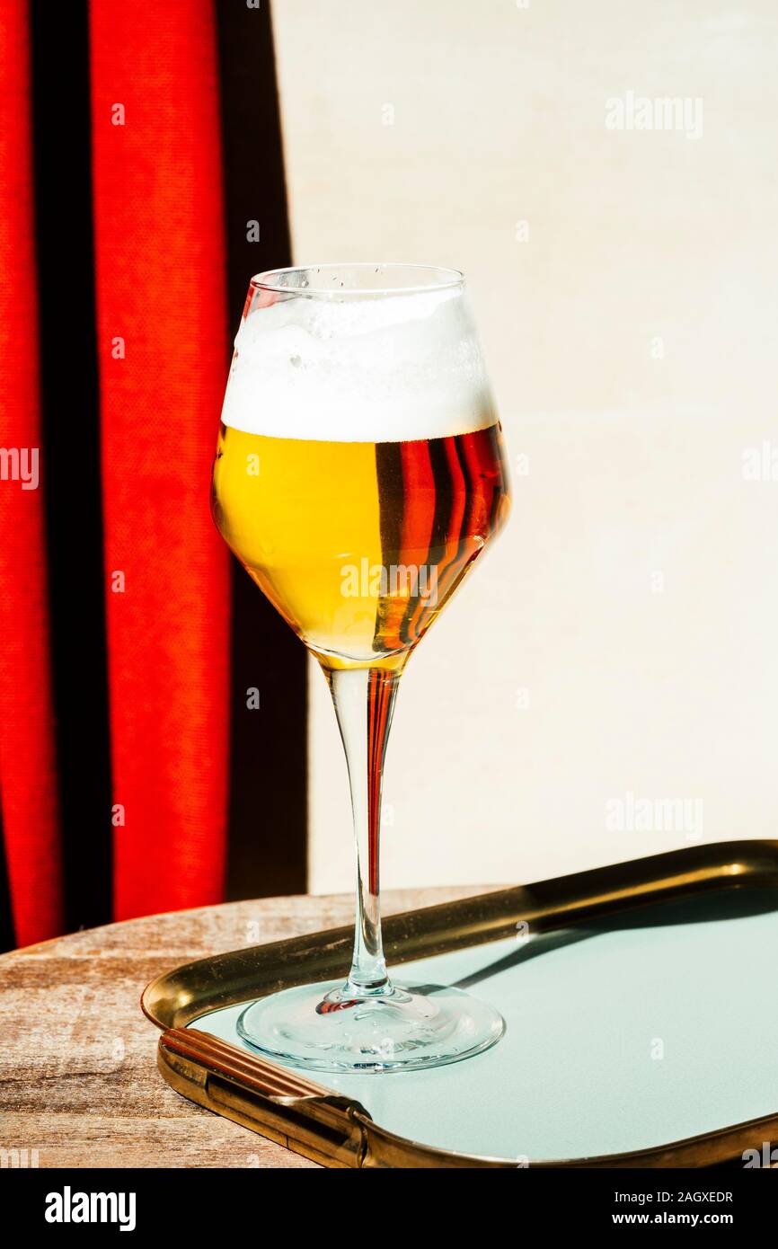 Beer in flute, pils or pilsner, with tortilla chips, light colorful ...