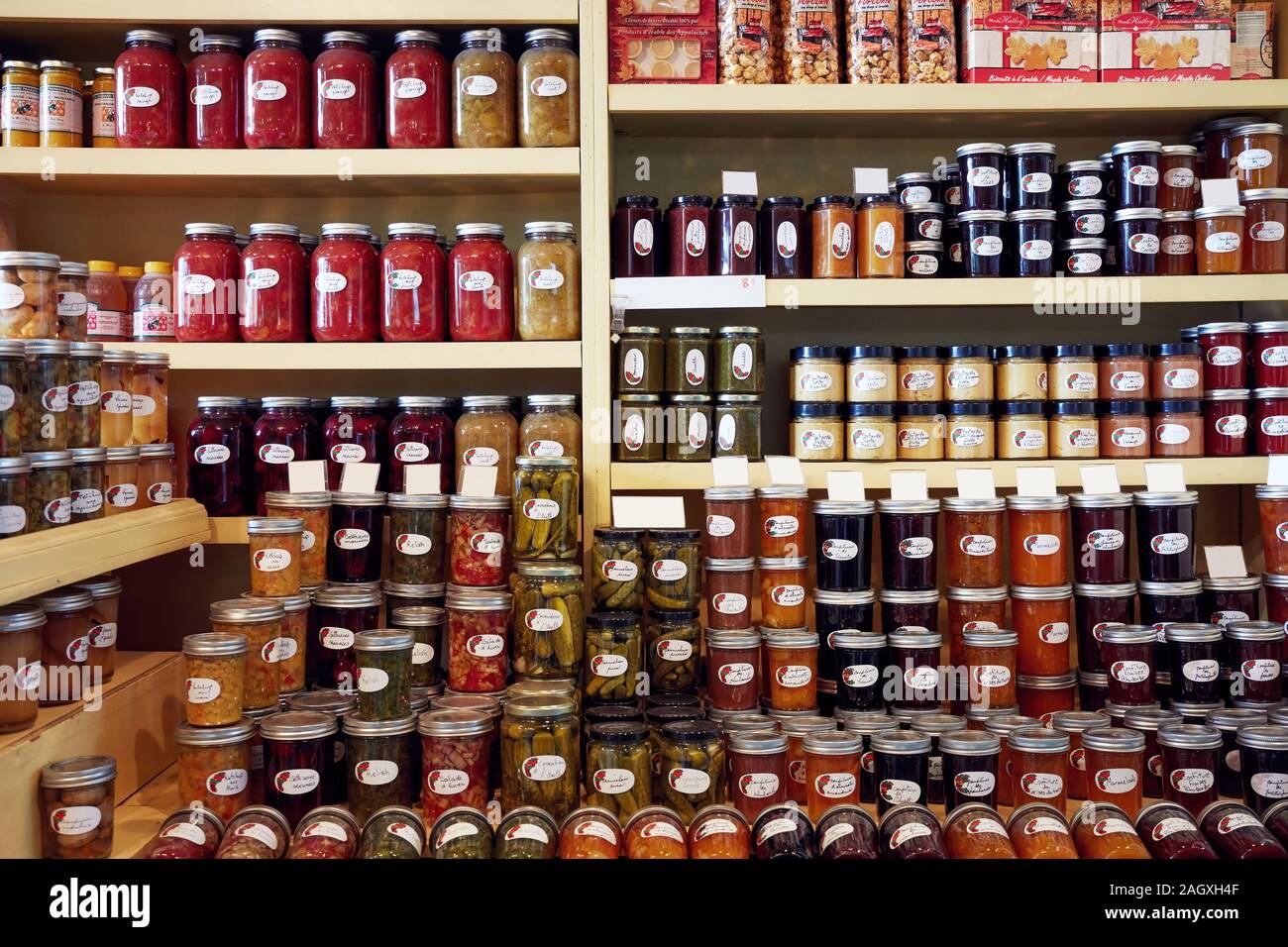 Traditional organic homemade jams, ketchup and conserved vegetables in ...