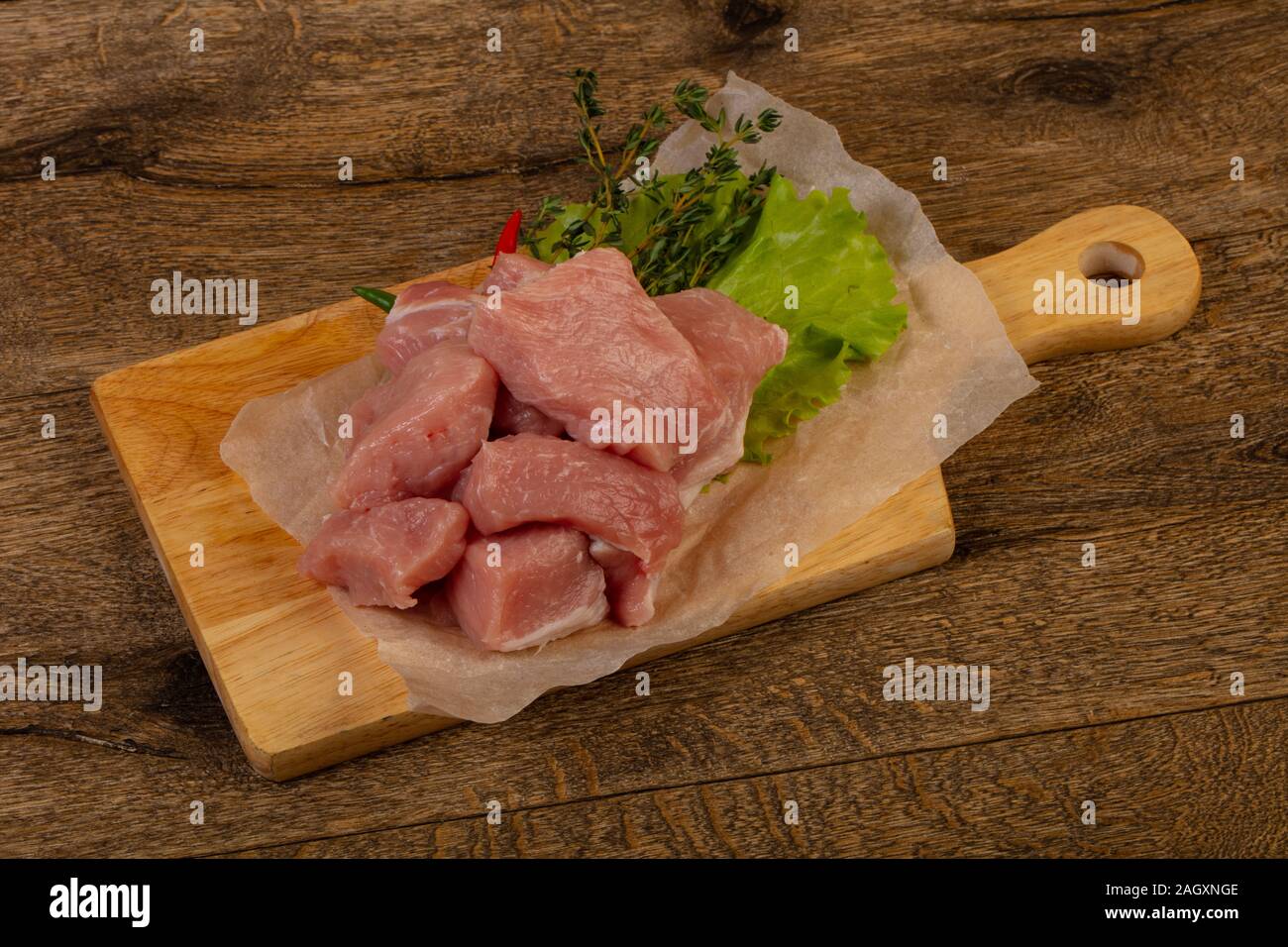 Raw pork meat heap for roast Stock Photo - Alamy