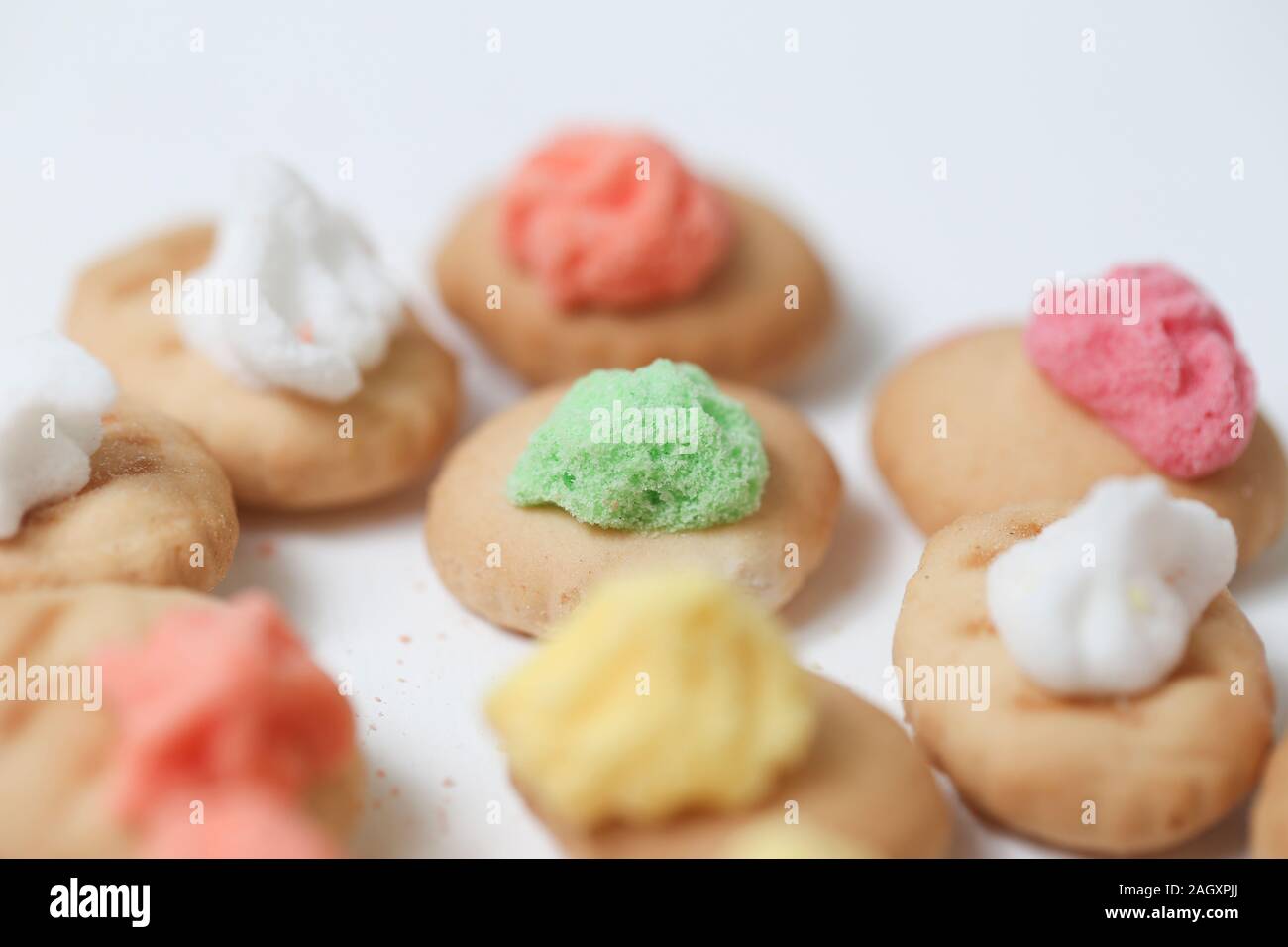 Belly button iced gem biscuits on white background Stock Photo - Alamy