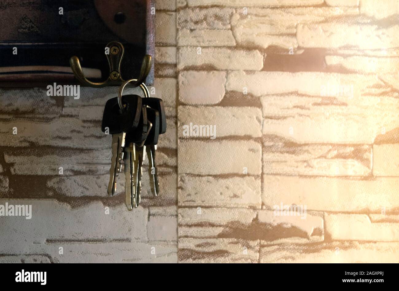 Keys hanging on hook hi-res stock photography and images - Alamy