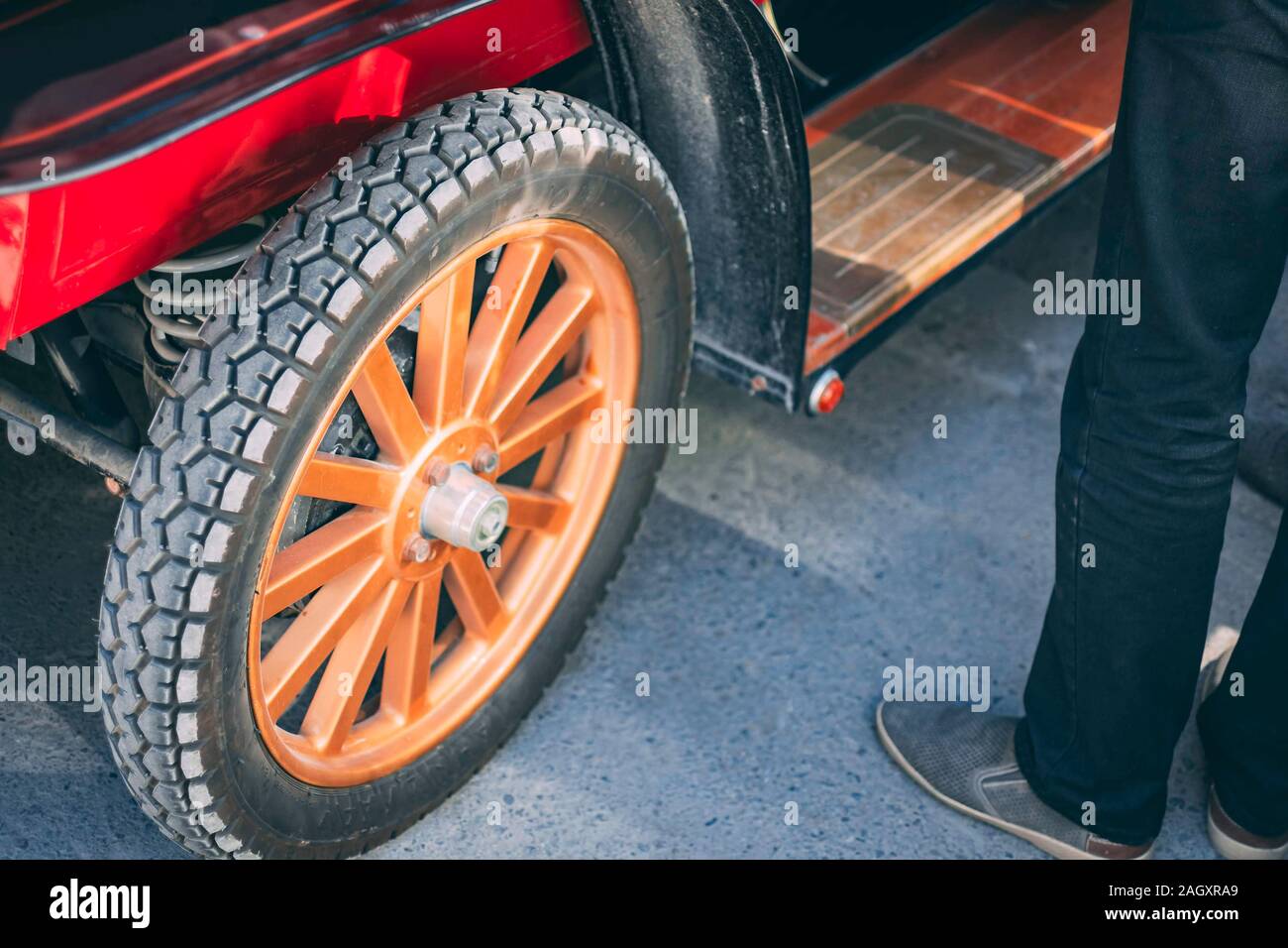 Detail of front vintage red car wheels Stock Photo - Alamy