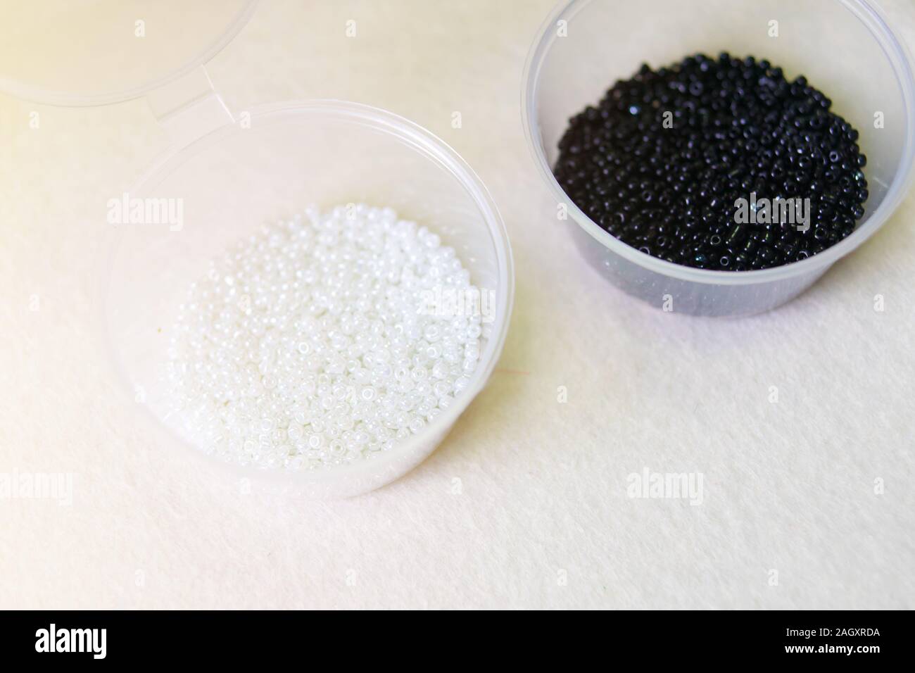 Sequins beads container felt in the containers Stock Photo - Alamy