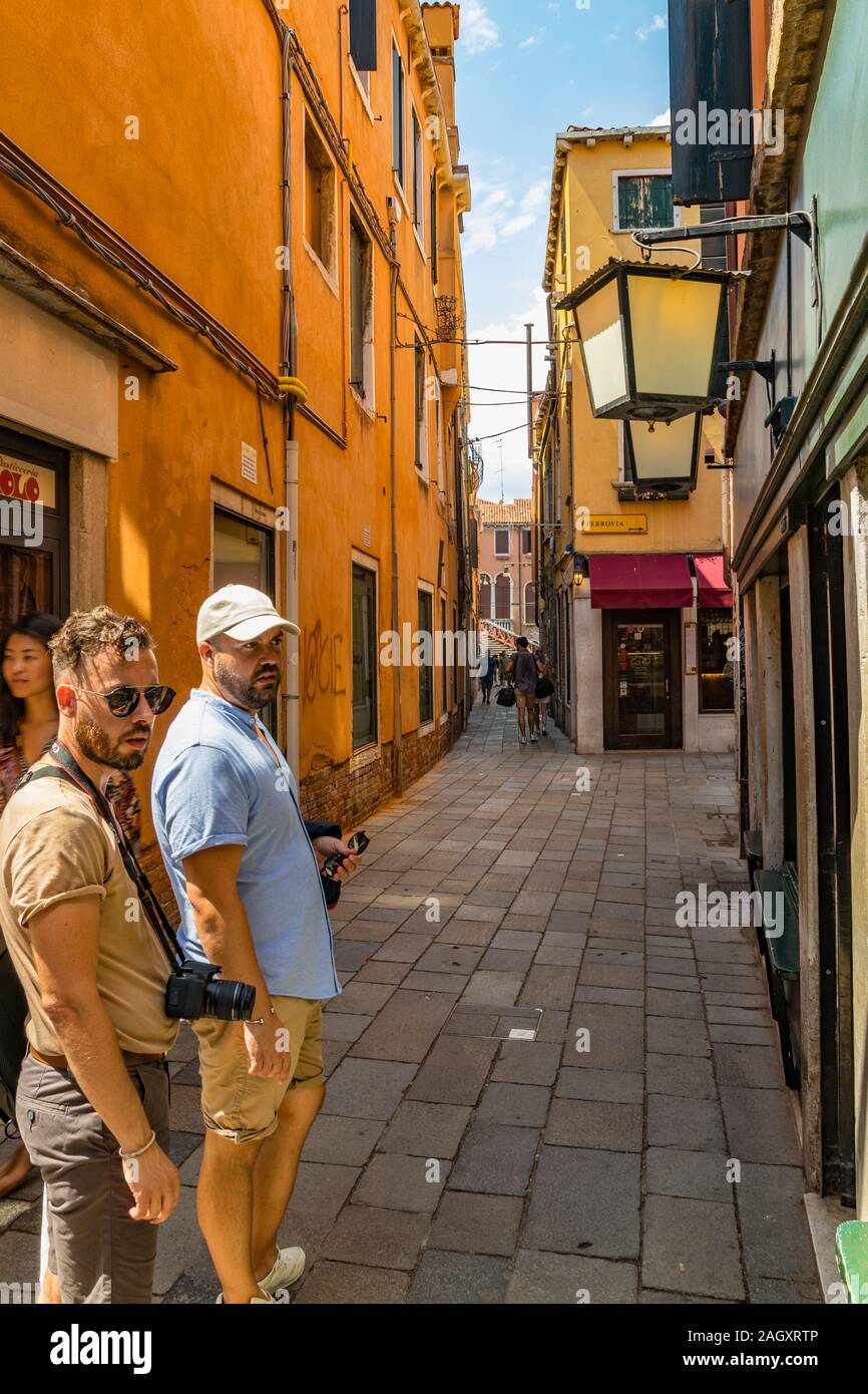 VENICE, ITALY - August 02, 2019: Narrow pedestrian streets of Venice ...