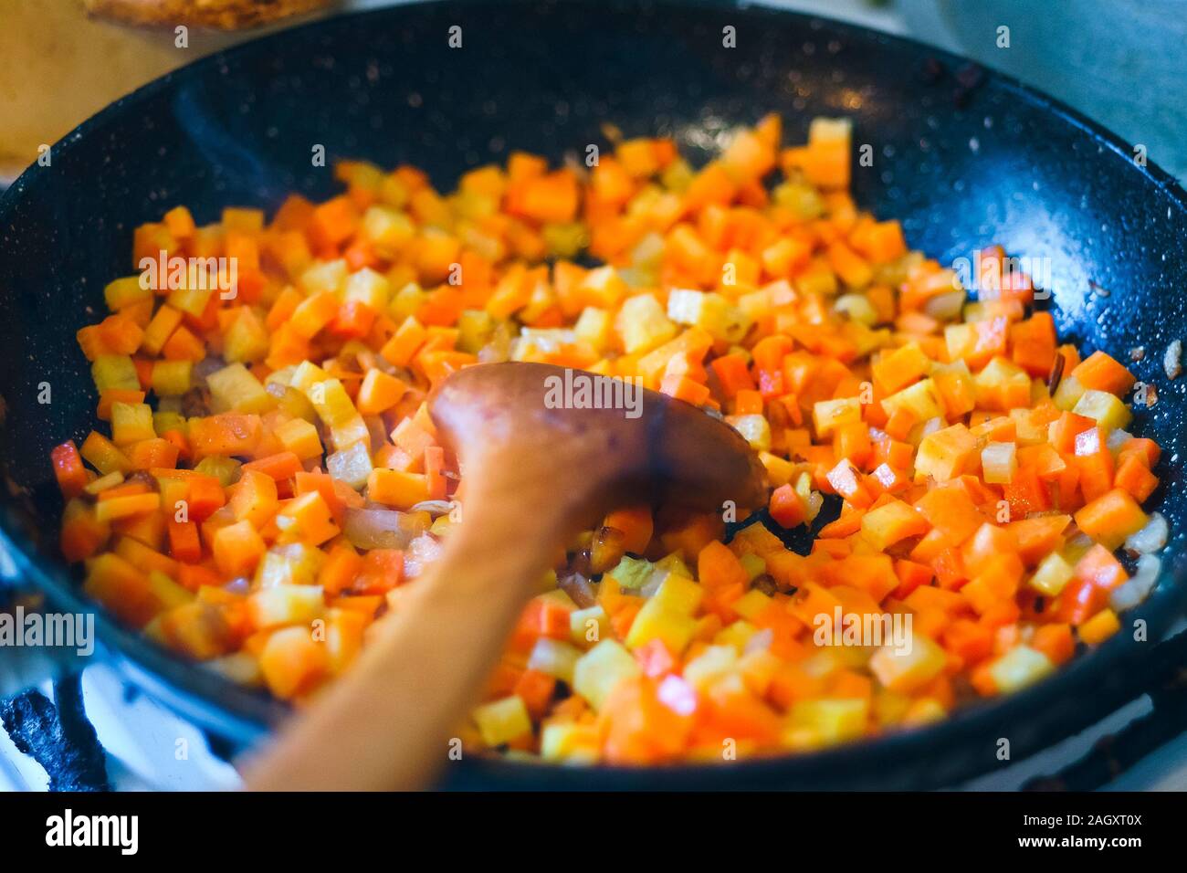 Chopped carrots frying on the pan. Healthy eating and lifestyle. Food ...