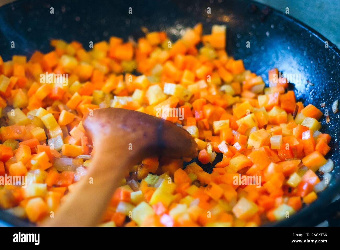 Chopped carrots frying on the pan. Healthy eating and lifestyle. Food ...