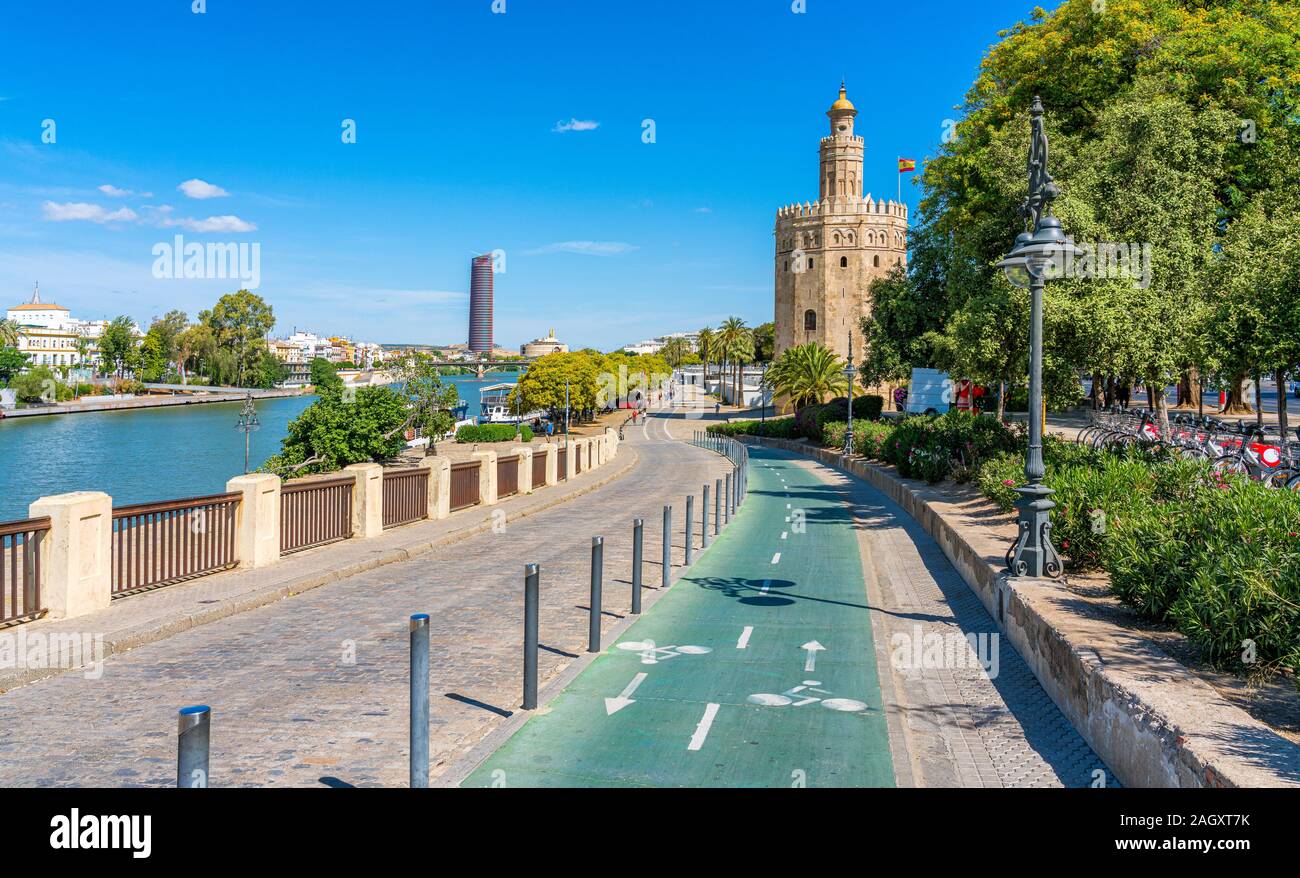 Scenic sight in Seville with the famous Torre del Oro and the ...
