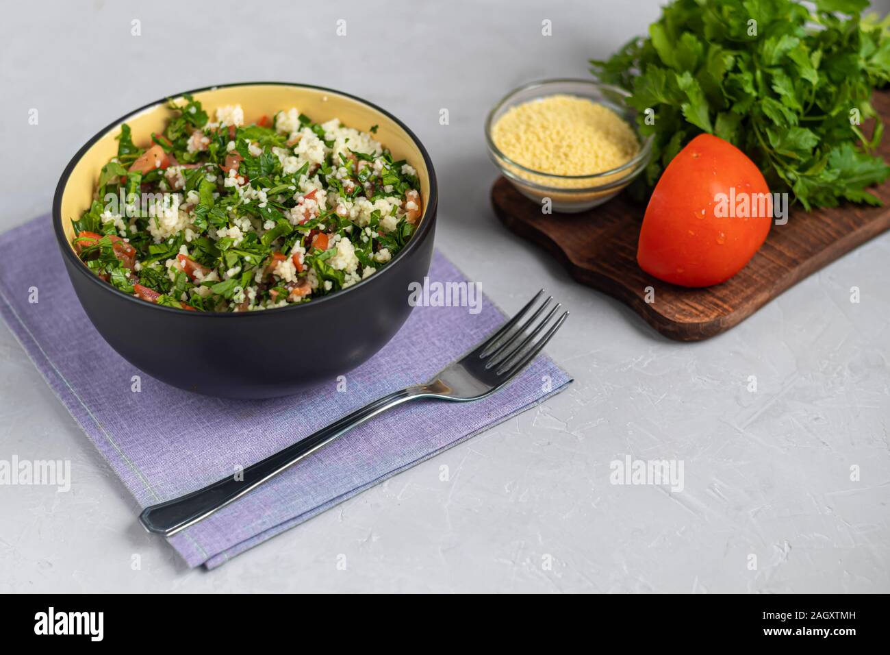 Tabbouleh salad in a round plate Stock Photo - Alamy