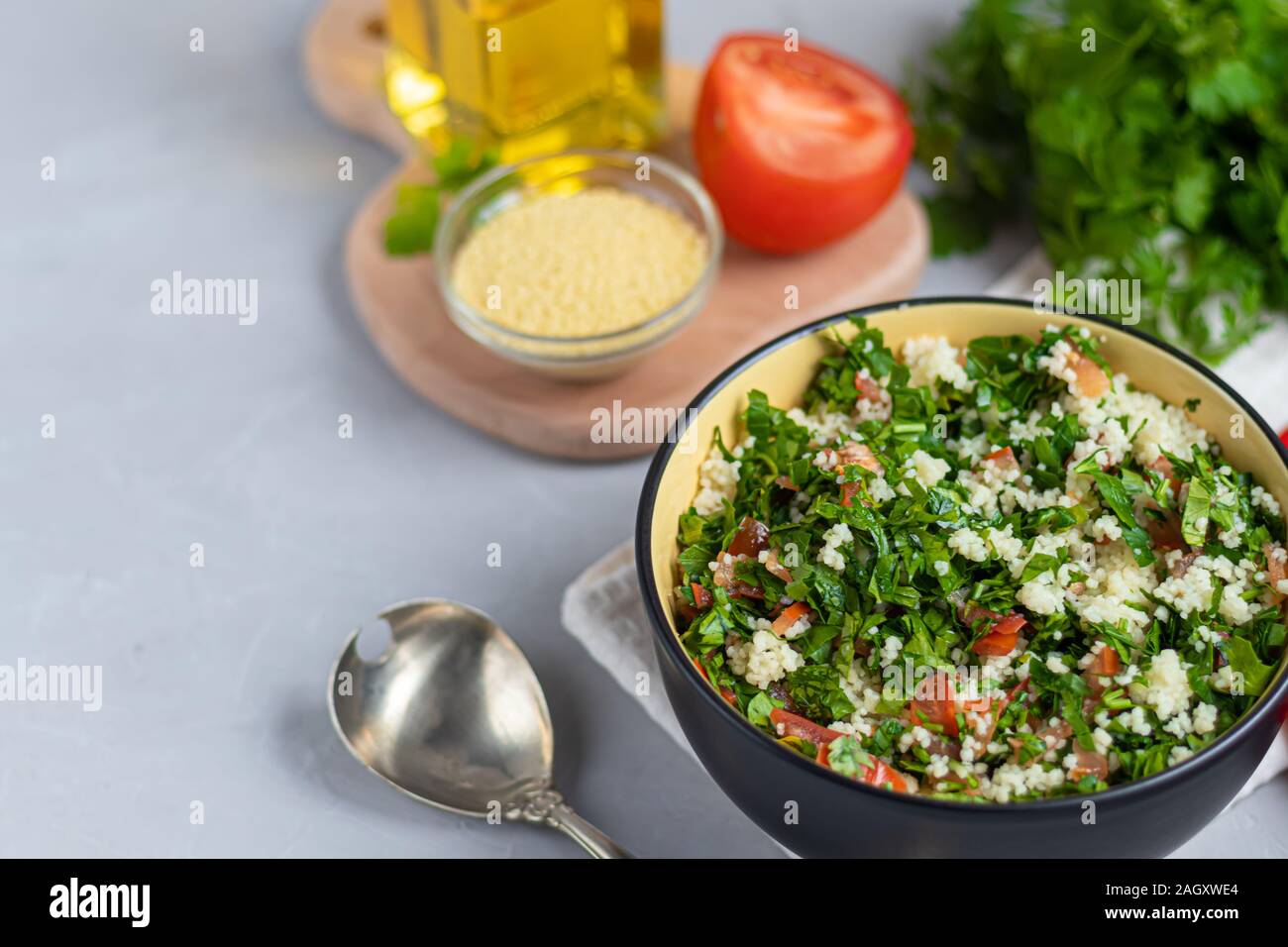 Tabbouleh salad in a round plate Stock Photo - Alamy