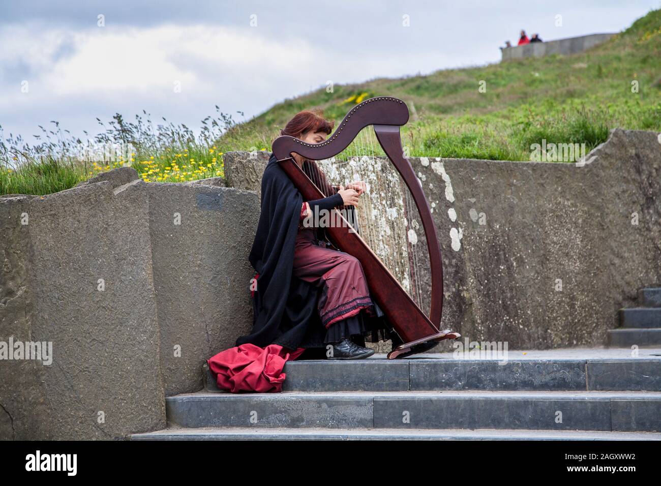 Street Harpist at the Cliffs of Moher, County Clare, Ireland, Europe ...