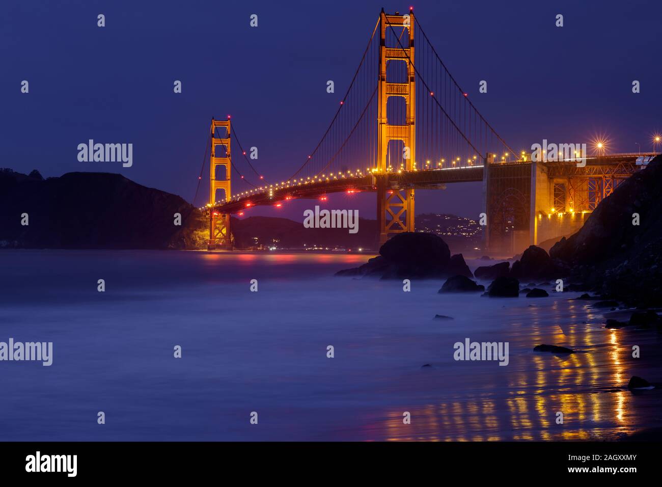The Golden Gate Bridge glowing in the dark Stock Photo - Alamy
