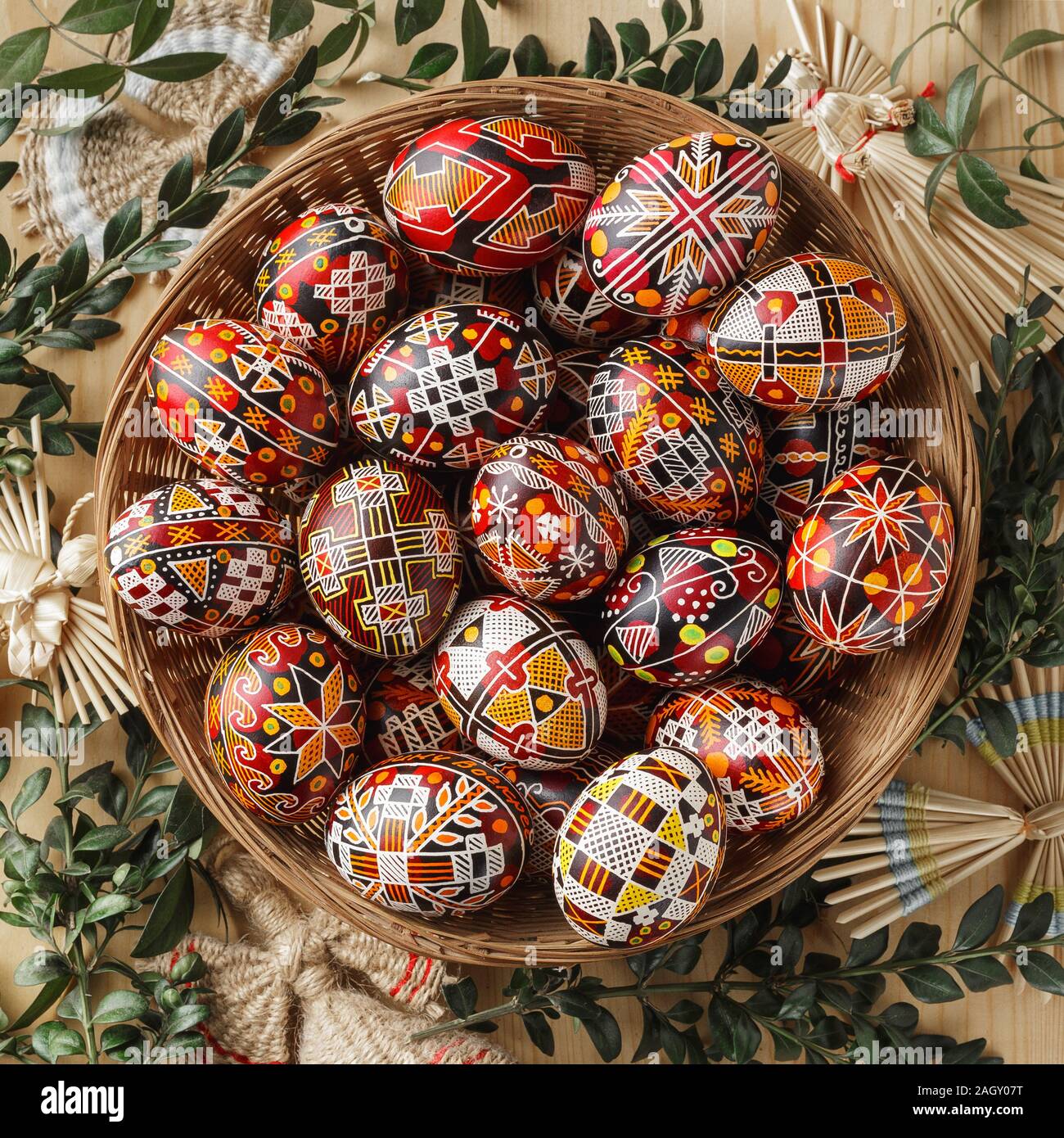 Big woven dish with Pysanky. Ukrainian Easter eggs decorated with wax ...