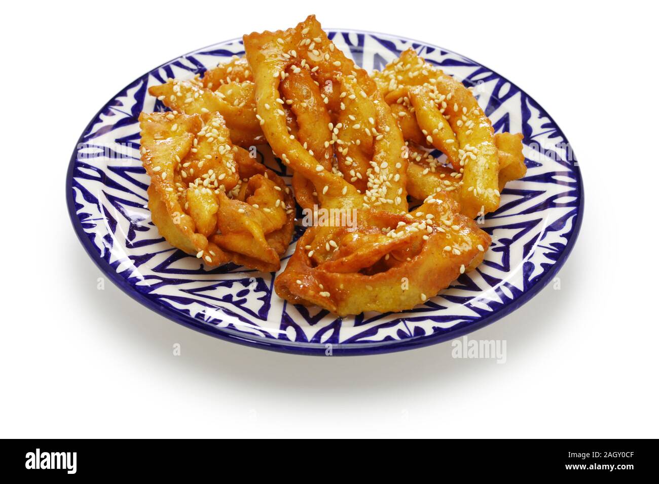 homemade chebakia, moroccan ramadan cookie isolated on white background ...