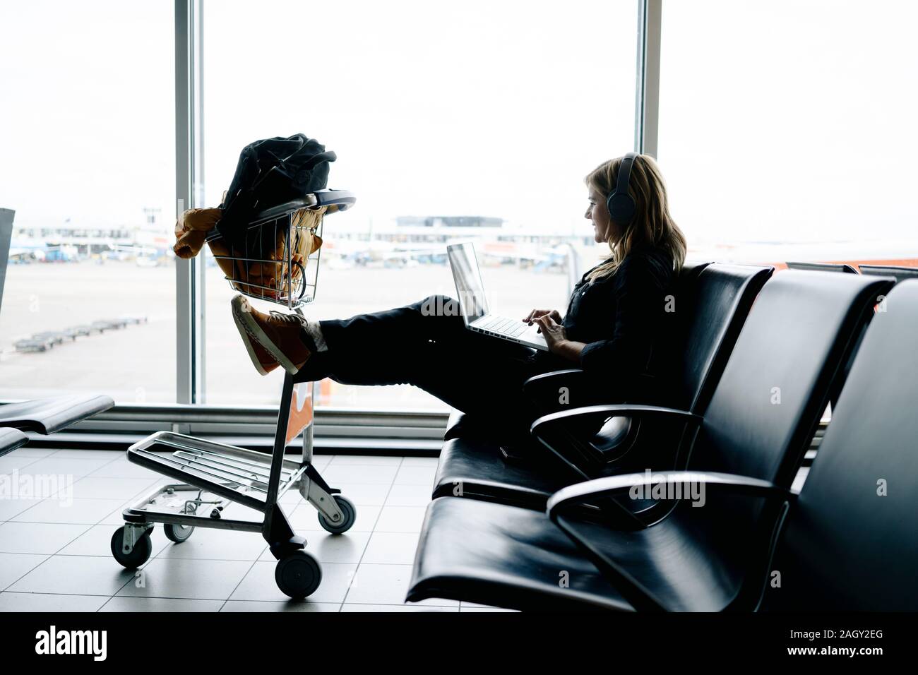 Waiting for boarding call hi-res stock photography and images - Alamy