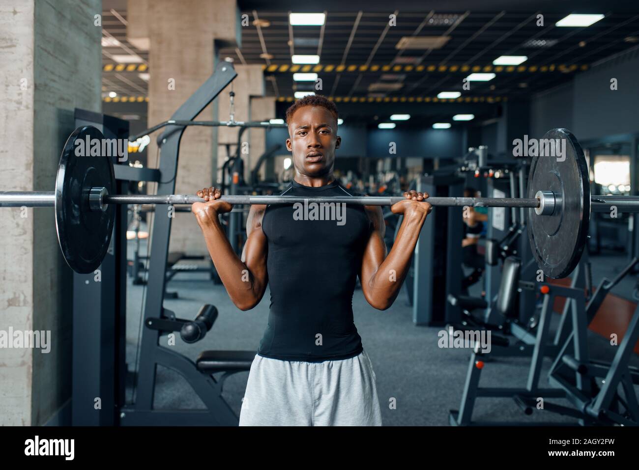 Athlete doing exercise barbell hi-res stock photography and images - Alamy