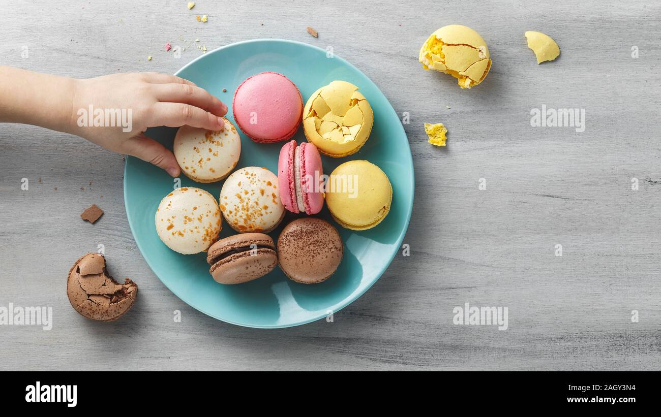Hand reaching cake hi-res stock photography and images - Alamy