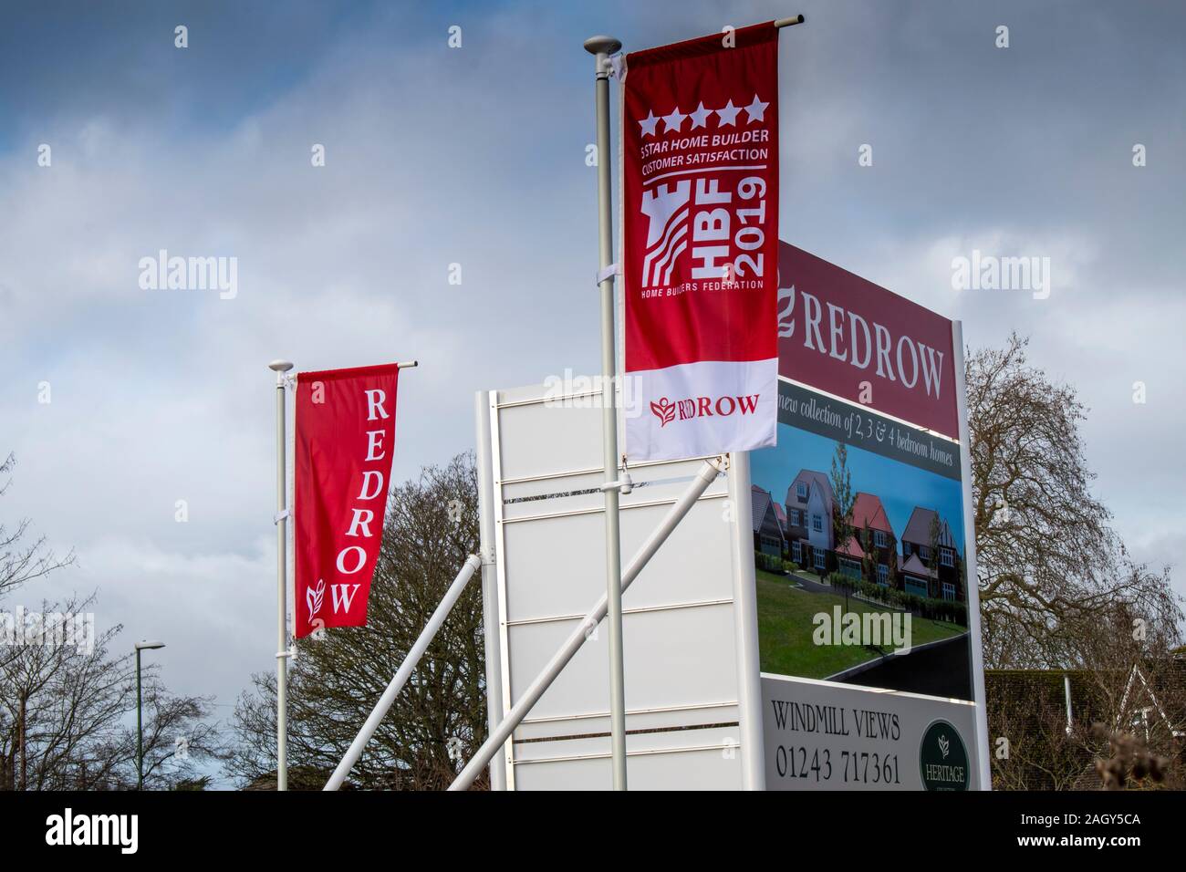 Barnham, West Sussex, UK, December 22, 2019. Redrow Homes PLC Flags and ...