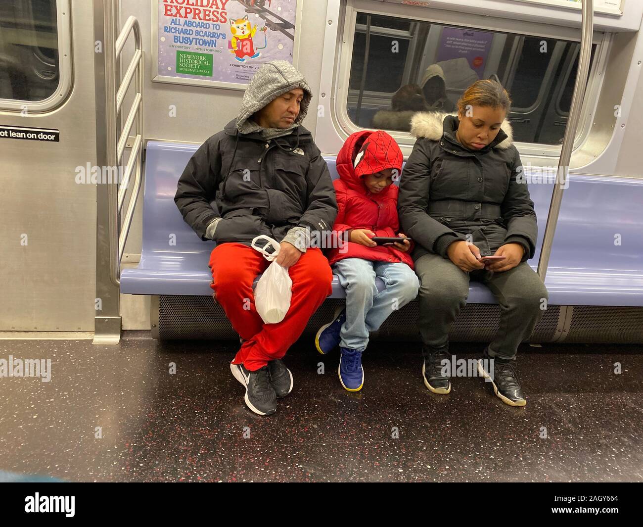 People sitting on a new subway train hi-res stock photography and images - Alamy