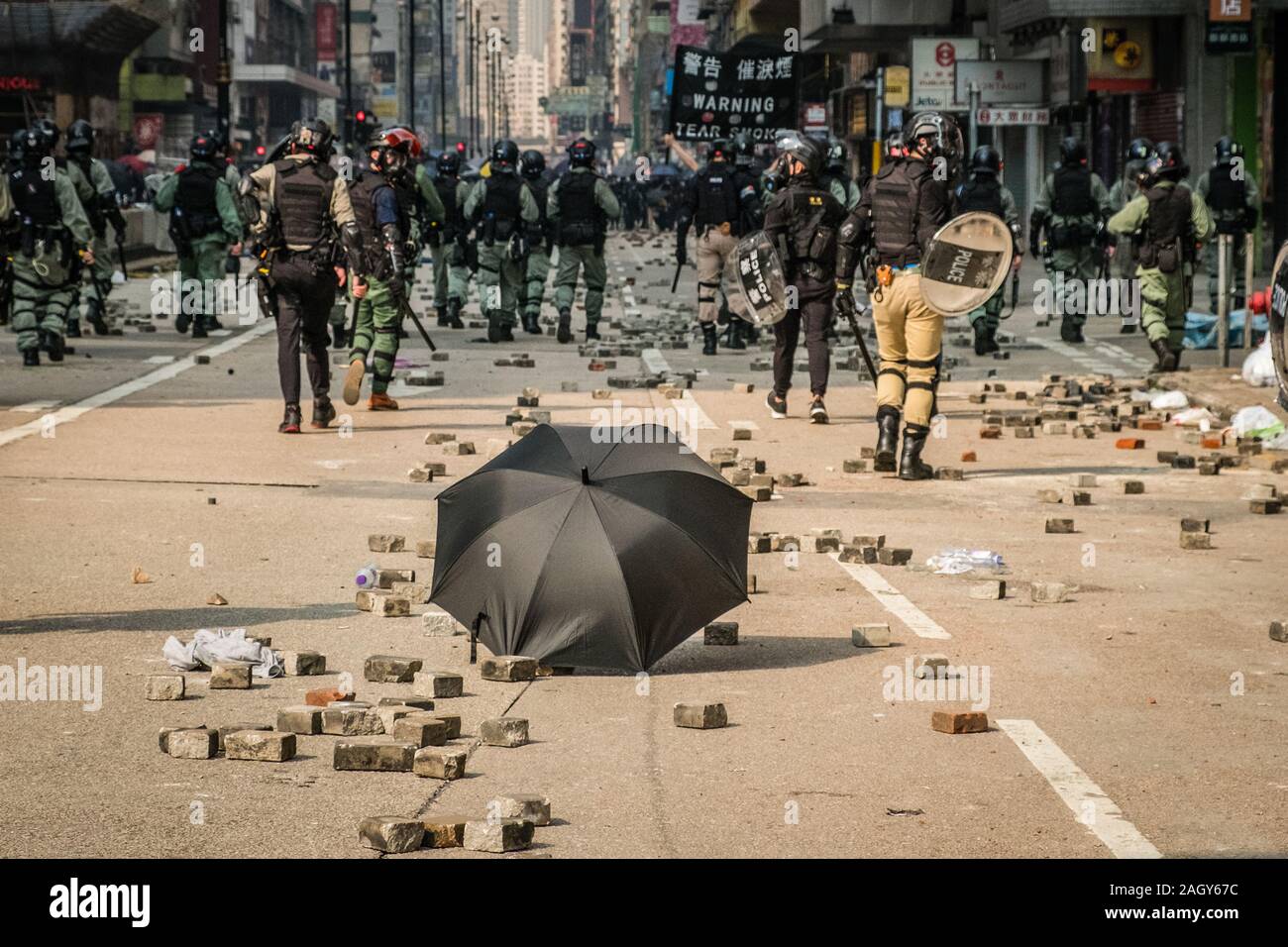 HongKong - November, 2019: Umrella on floor with Hong Kong riot police ...