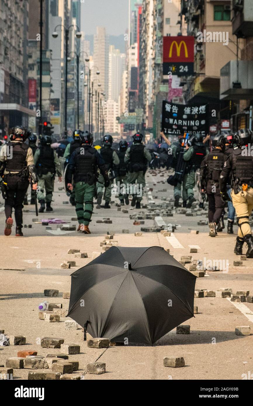 HongKong - November, 2019: Umrella on floor with Hong Kong riot police ...