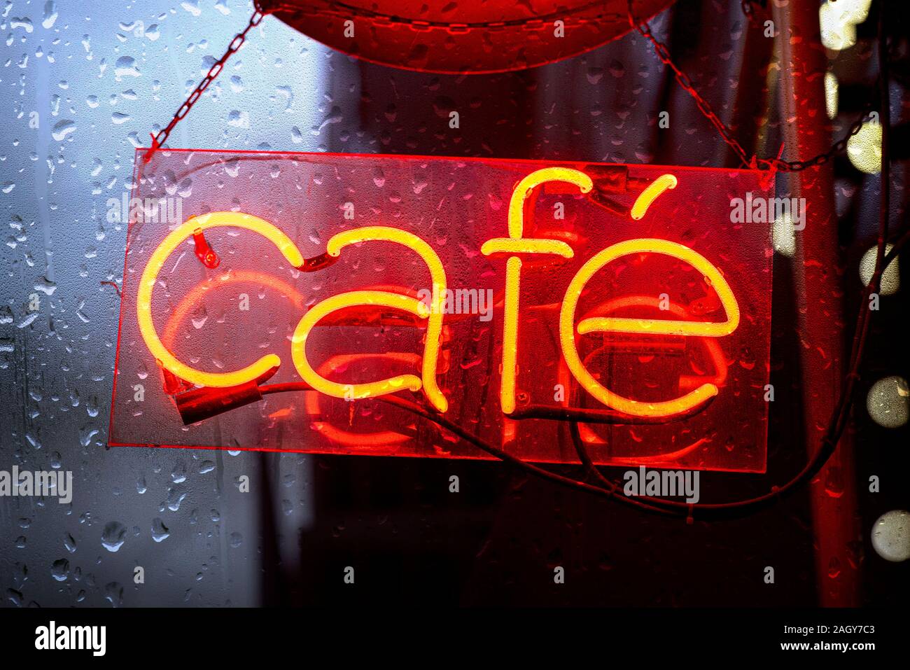 CAFE neon red Sign during heavy raining Night, electronic Sign for Cafe ...