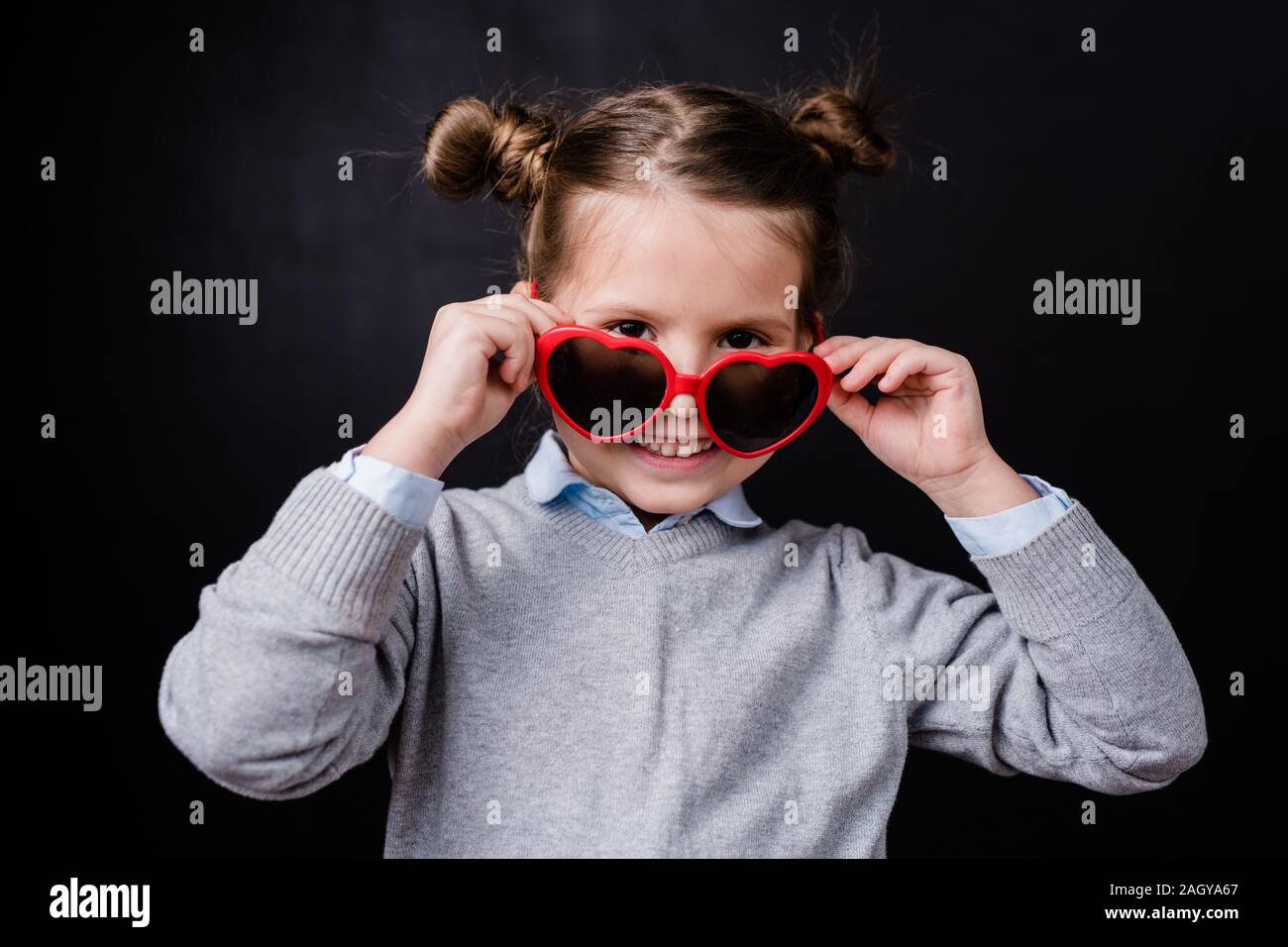 Portrait cute girl taking off hi-res stock photography and images - Alamy