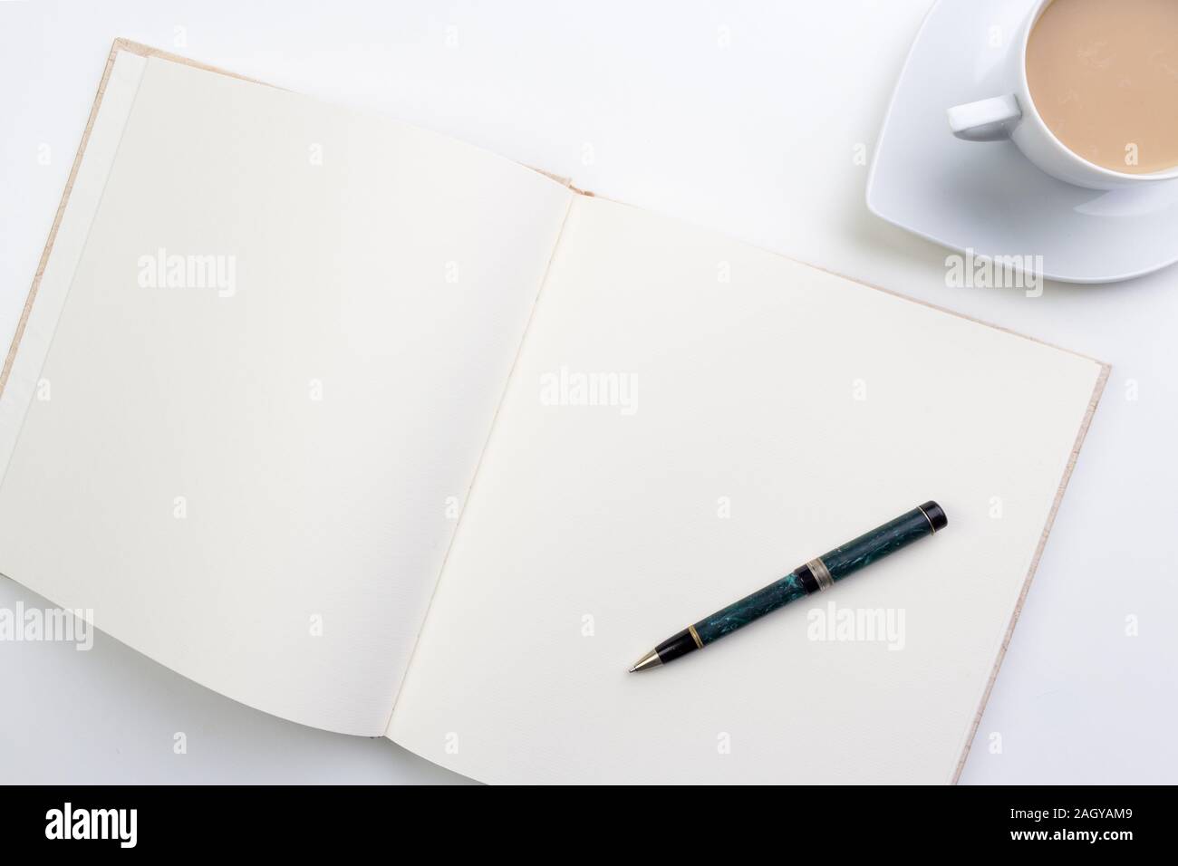 White piece of paper - empty page for copy space - book and pen for ...