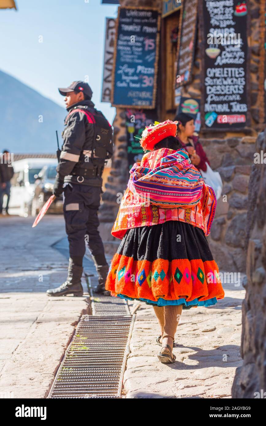 OLLANTAYTAMBO, PERU - JUNE 26, 2019: Peruvian woman cholita dressed in ...