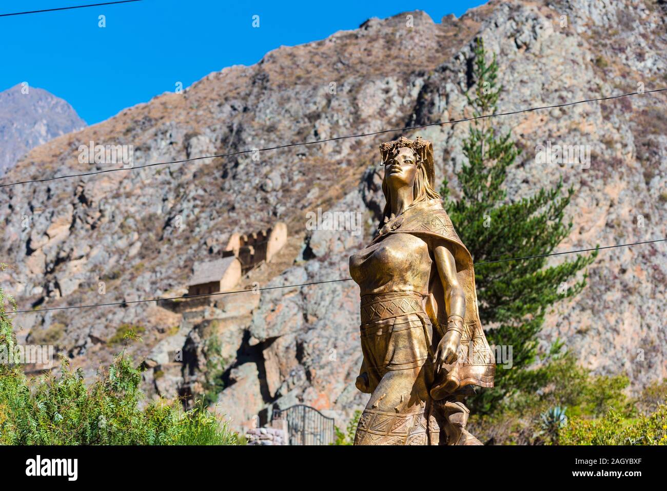 Golden Inca statue, Ollantaytambo, Peru. With selective focus Stock ...