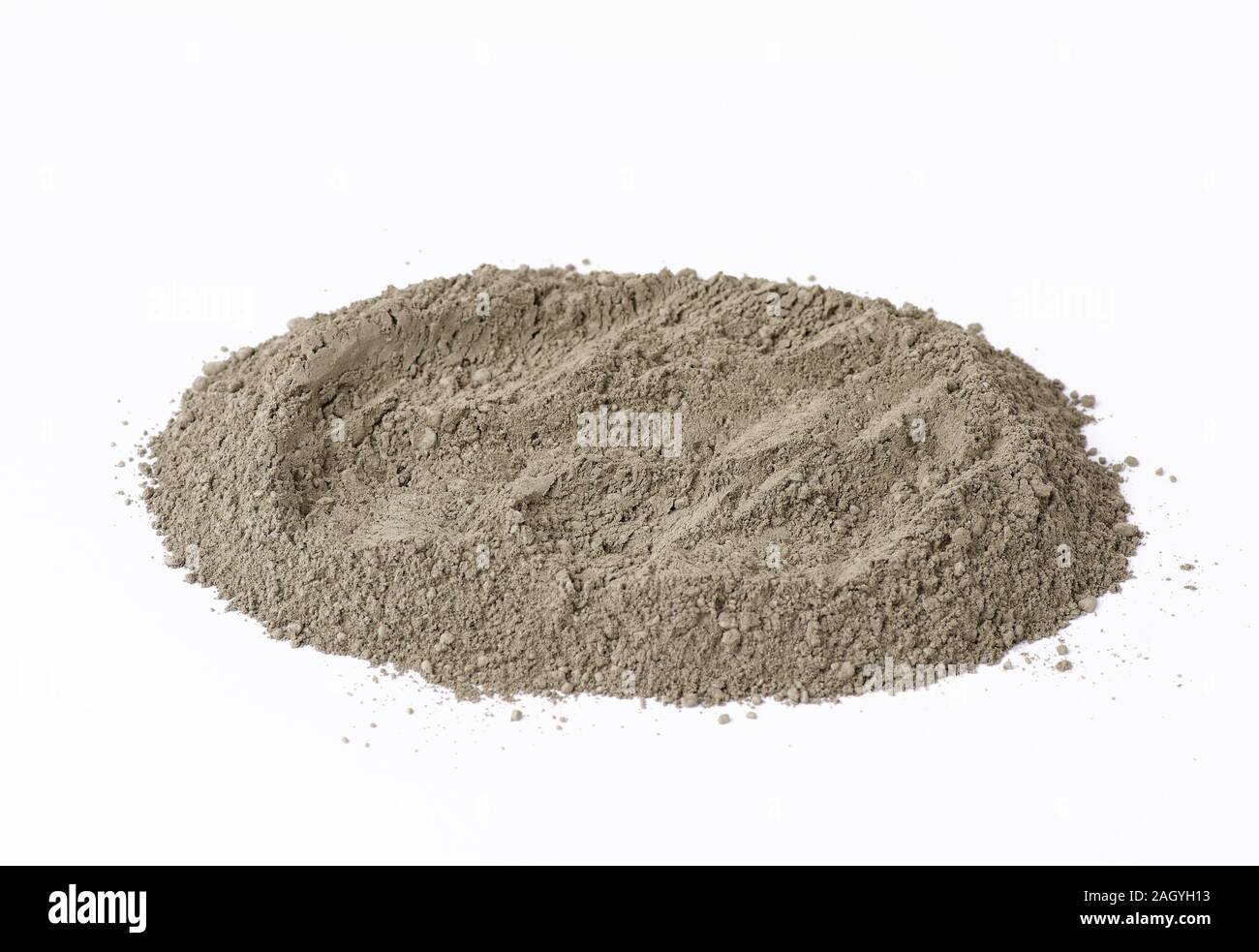 pile of gray dry Crimean fine clay on a white background, treatment for ...