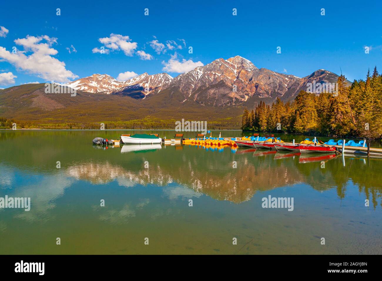 Beautiful reflection on water of Pyramid lake, Jasper National Park ...