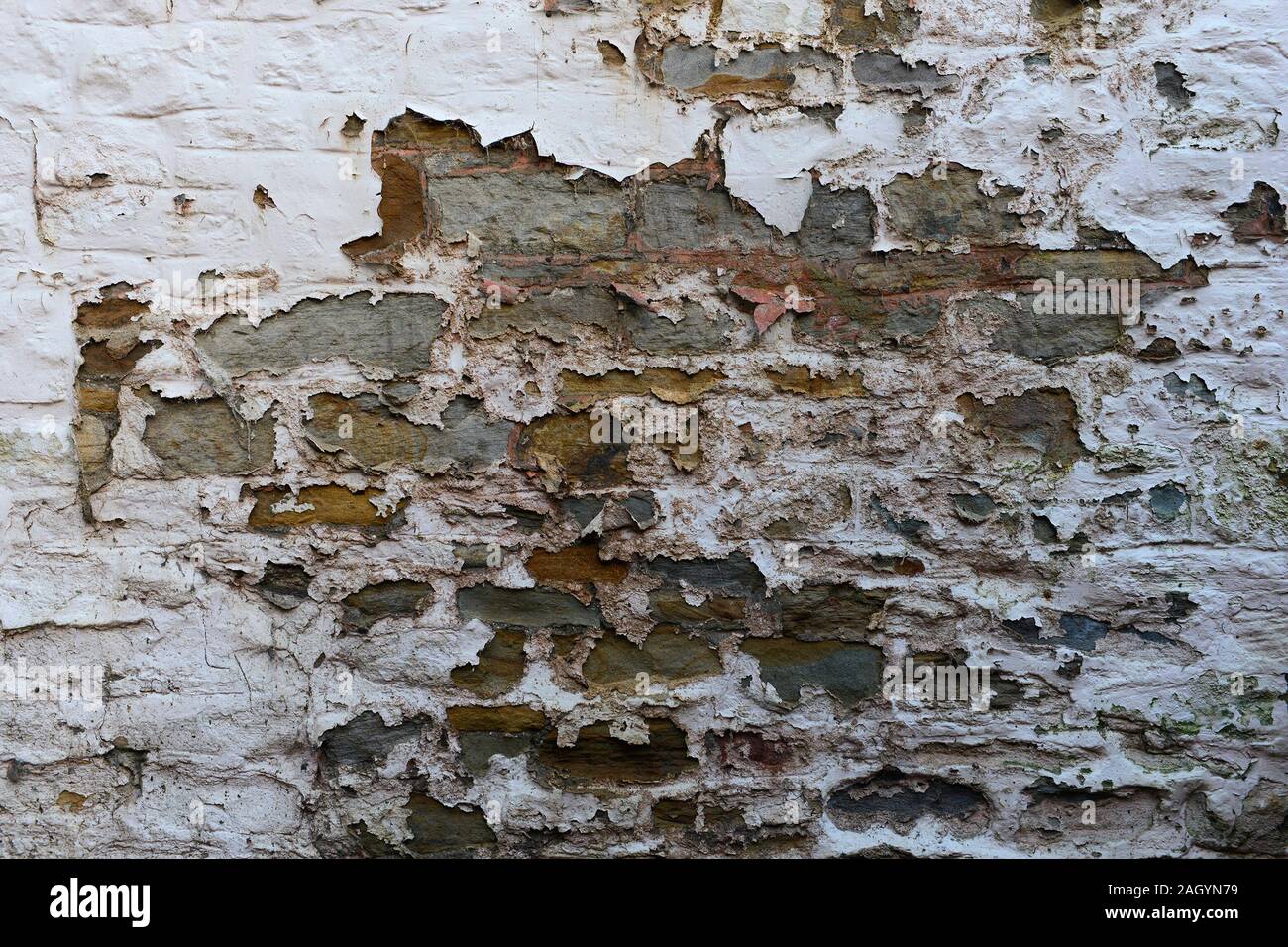 Layers of peeling paint on a building by the river Wear in Durham, UK ...