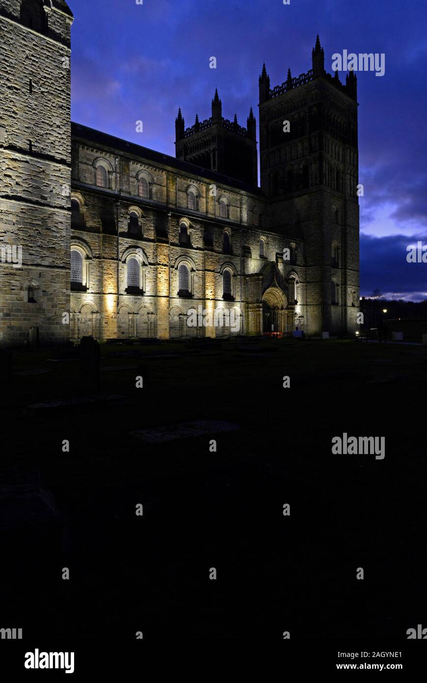 Exterior of the north side of Durham cathedral at dusk, attractively ...
