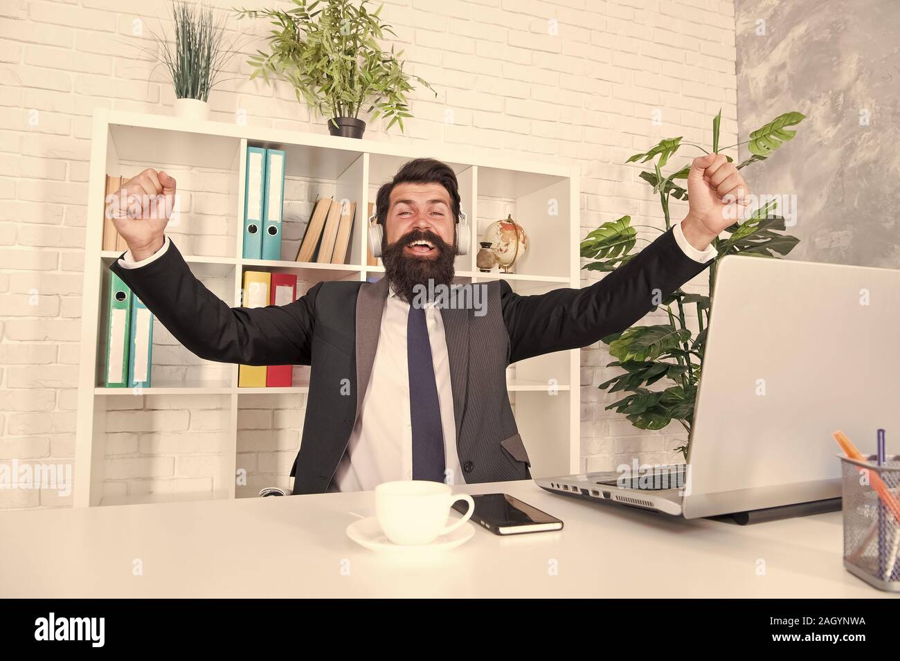 Successful businessman. Man office worker listening music headphones ...