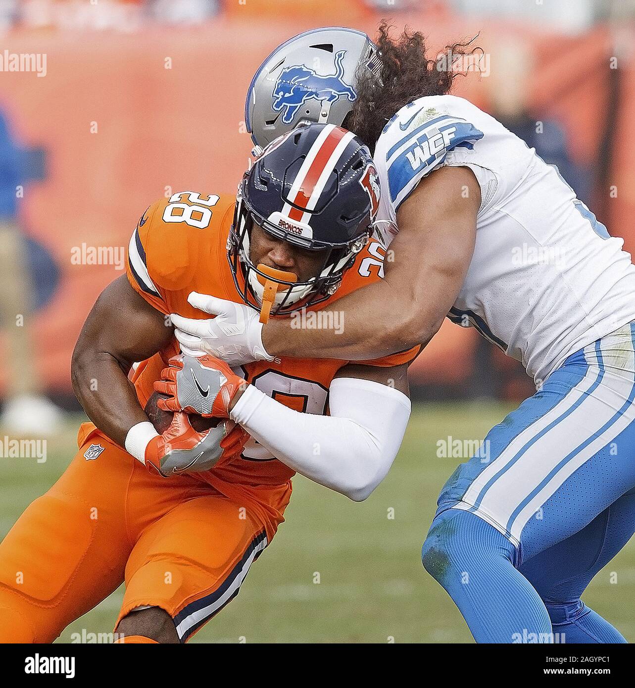 Denver, Colorado, USA. 22nd Dec, 2019. Broncos RB ROYCE FREEMAN, left ...
