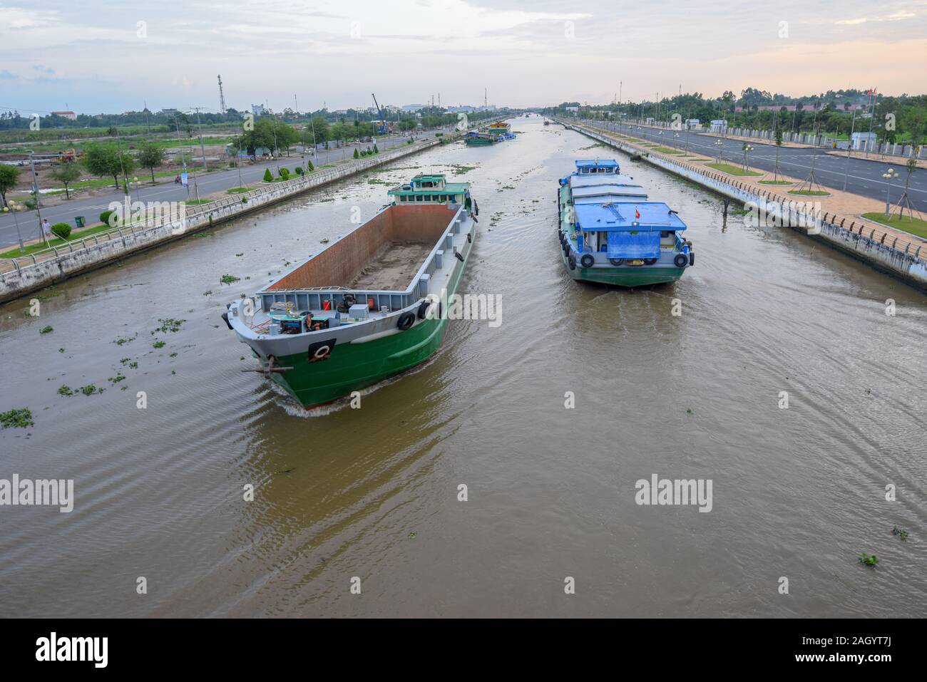 boat carry fruit on Xa No river in Hau Giang Stock Photo - Alamy